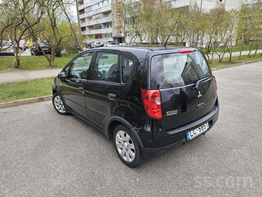 Black Mitsubishi Colt 2011 in Riga, with an engine capacity of 1.30 L and mileage of 136 thousand km for 2850 €, photo 4 on AUTOMOTO.COM.LV