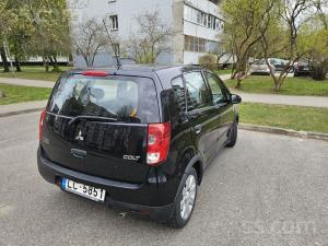 Black Mitsubishi Colt 2011 in Riga, with an engine capacity of 1.30 L and mileage of 136 thousand km for 2850 €, photo 5 on AUTOMOTO.COM.LV