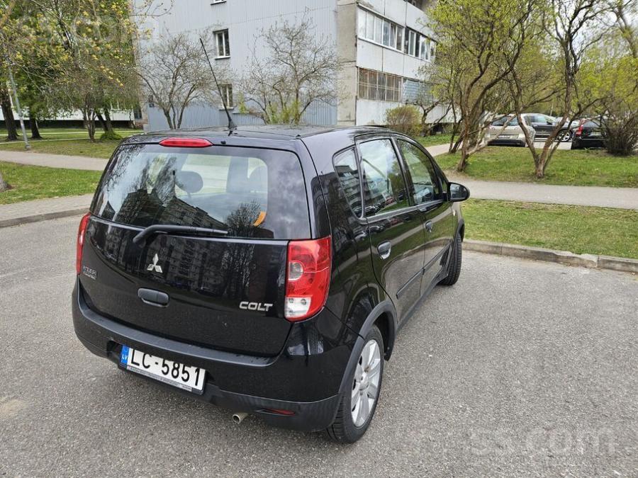 Black Mitsubishi Colt 2011 in Riga, with an engine capacity of 1.30 L and mileage of 136 thousand km for 2850 €, photo 5 on AUTOMOTO.COM.LV