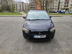 Black Mitsubishi Colt 2011 in Riga, with an engine capacity of 1.30 L and mileage of 136 thousand km for 2850 €, photo 7 on AUTOMOTO.COM.LV