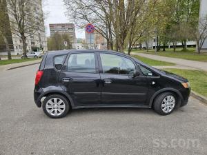 Black Mitsubishi Colt 2011 in Riga, with an engine capacity of 1.30 L and mileage of 136 thousand km for 2850 €, photo 8 on AUTOMOTO.COM.LV