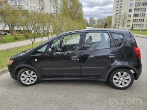 Black Mitsubishi Colt 2011 in Riga, with an engine capacity of 1.30 L and mileage of 136 thousand km for 2850 €, photo 9 on AUTOMOTO.COM.LV