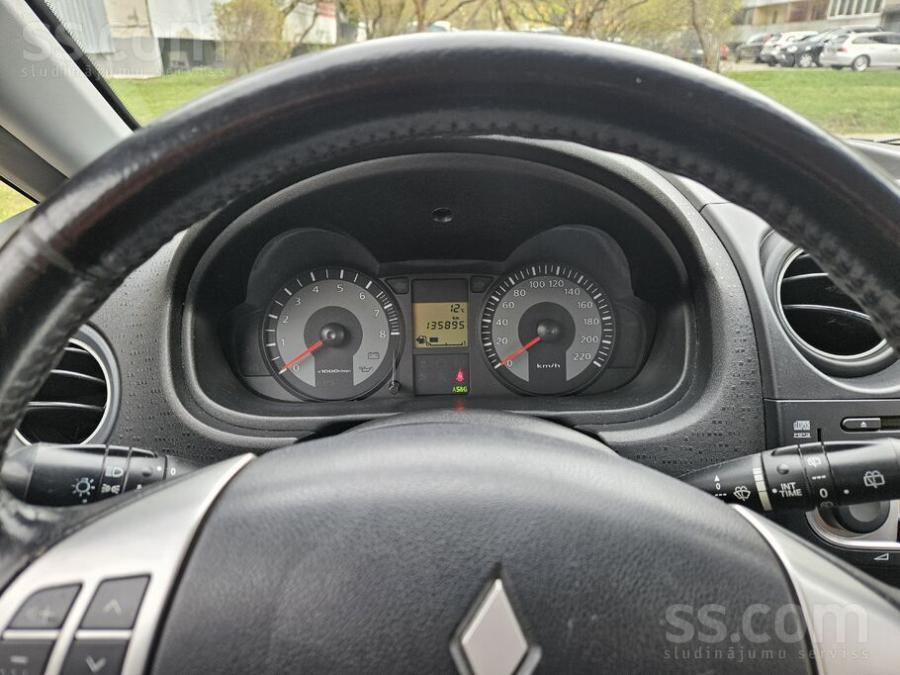 Black Mitsubishi Colt 2011 in Riga, with an engine capacity of 1.30 L and mileage of 136 thousand km for 2850 €, photo 10 on AUTOMOTO.COM.LV