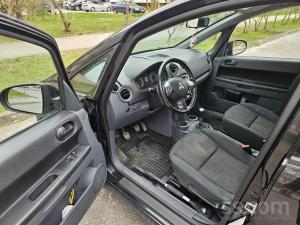 Black Mitsubishi Colt 2011 in Riga, with an engine capacity of 1.30 L and mileage of 136 thousand km for 2850 €, photo 11 on AUTOMOTO.COM.LV