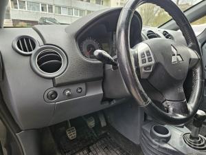 Black Mitsubishi Colt 2011 in Riga, with an engine capacity of 1.30 L and mileage of 136 thousand km for 2850 €, photo 13 on AUTOMOTO.COM.LV