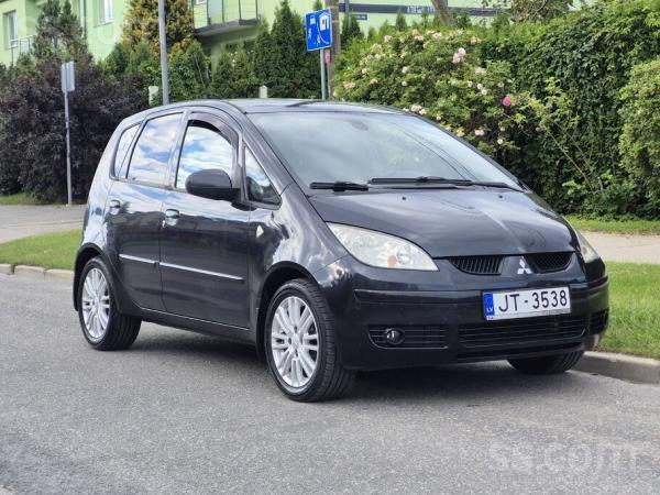 Black Mitsubishi Colt 2011 in Riga, with an engine capacity of 1.50 L and mileage of 206 thousand km for 2700 €, photo 1 on AUTOMOTO.COM.LV