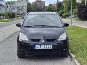 Black Mitsubishi Colt 2011 in Riga, with an engine capacity of 1.50 L and mileage of 206 thousand km for 2700 €, photo 3 on AUTOMOTO.COM.LV