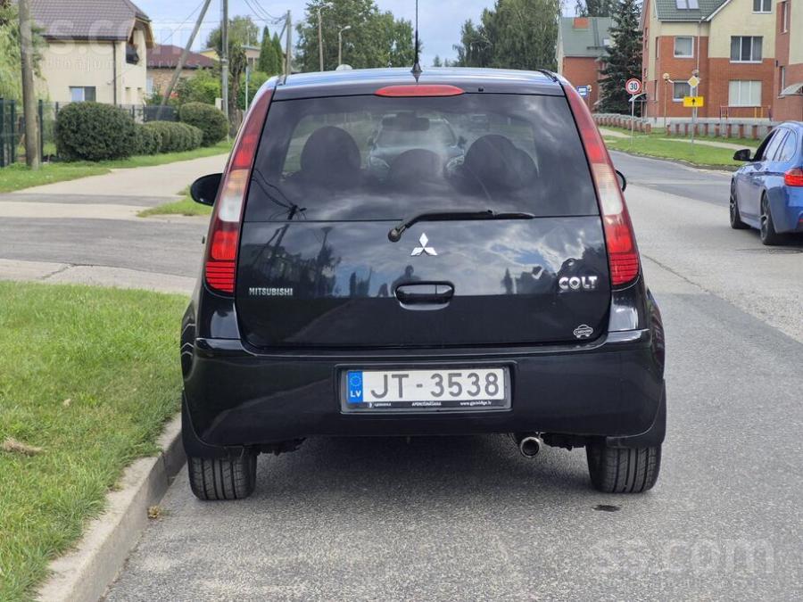 Black Mitsubishi Colt 2011 in Riga, with an engine capacity of 1.50 L and mileage of 206 thousand km for 2700 €, photo 6 on AUTOMOTO.COM.LV