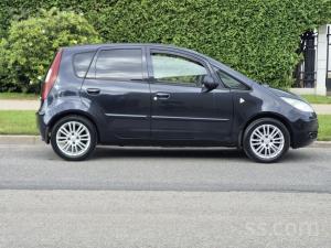 Black Mitsubishi Colt 2011 in Riga, with an engine capacity of 1.50 L and mileage of 206 thousand km for 2700 €, photo 8 on AUTOMOTO.COM.LV