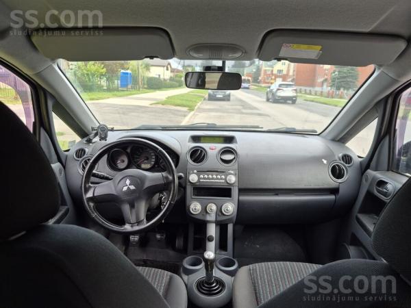 Black Mitsubishi Colt 2011 in Riga, with an engine capacity of 1.50 L and mileage of 206 thousand km for 2700 €, photo 9 on AUTOMOTO.COM.LV
