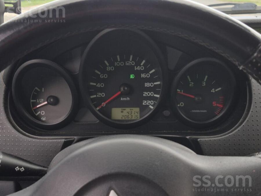 Black Mitsubishi Colt 2011 in Riga, with an engine capacity of 1.50 L and mileage of 206 thousand km for 2700 €, photo 13 on AUTOMOTO.COM.LV