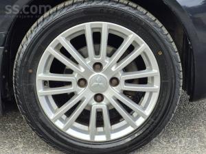 Black Mitsubishi Colt 2011 in Riga, with an engine capacity of 1.50 L and mileage of 206 thousand km for 2700 €, photo 14 on AUTOMOTO.COM.LV