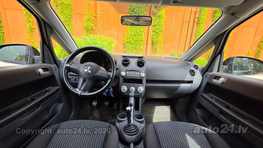 Melns Mitsubishi Colt 2008 Tallina, ar dzinēja tilpumu 1.30 L un nobraukumu 130 tūkst. km par 1490 €, foto 10 vietnē AUTOMOTO.COM.LV