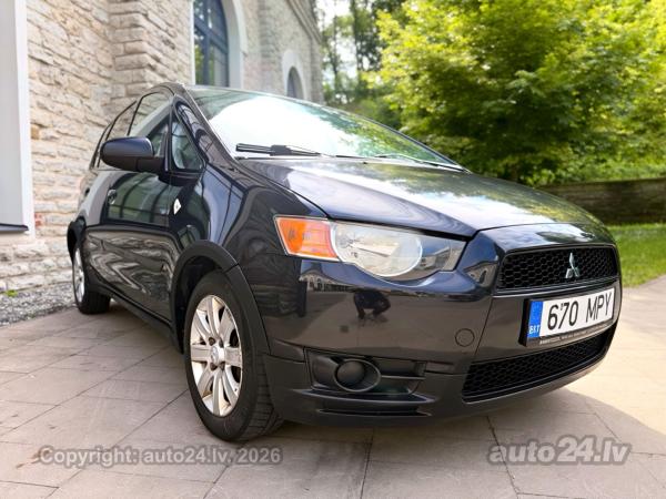 Melns Mitsubishi Colt 2010 Tallina, ar dzinēja tilpumu 1.30 L un nobraukumu 138 tūkst. km par 1899 €, foto 2 vietnē AUTOMOTO.COM.LV