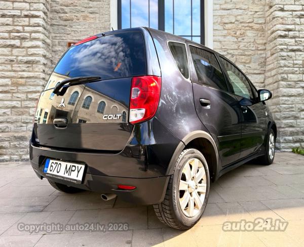 Melns Mitsubishi Colt 2010 Tallina, ar dzinēja tilpumu 1.30 L un nobraukumu 138 tūkst. km par 1899 €, foto 3 vietnē AUTOMOTO.COM.LV