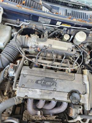 Zils Mitsubishi Colt 1999 Kauņa, ar dzinēja tilpumu 1.80 L un nobraukumu 208 tūkst. km par 999 €, foto  vietnē AUTOMOTO.COM.LV