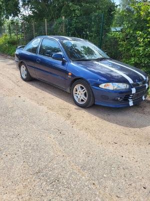 Zils Mitsubishi Colt 1999 Kauņa, ar dzinēja tilpumu 1.80 L un nobraukumu 208 tūkst. km par 999 €, foto 3 vietnē AUTOMOTO.COM.LV