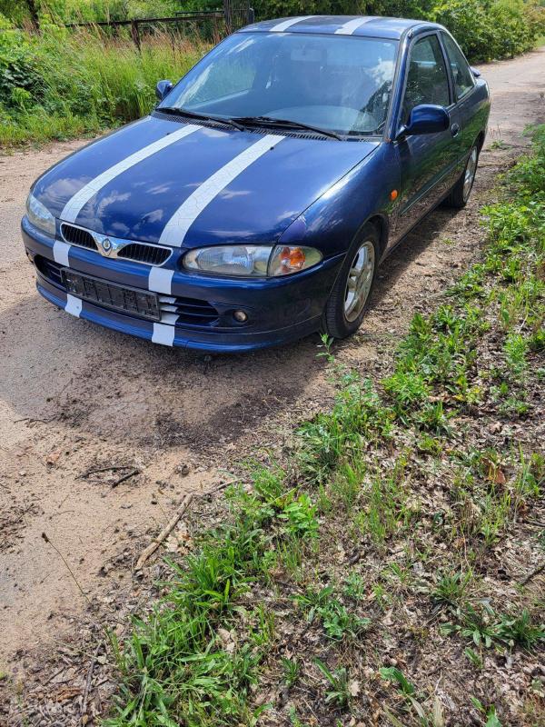 Zils Mitsubishi Colt 1999 Kauņa, ar dzinēja tilpumu 1.80 L un nobraukumu 208 tūkst. km par 999 €, foto 5 vietnē AUTOMOTO.COM.LV