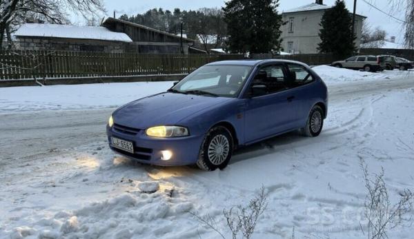 Blue Mitsubishi Colt 1998 in Riga, with an engine capacity of 1.30 L and mileage of 153 thousand km for 1350 €, photo 3 on AUTOMOTO.COM.LV