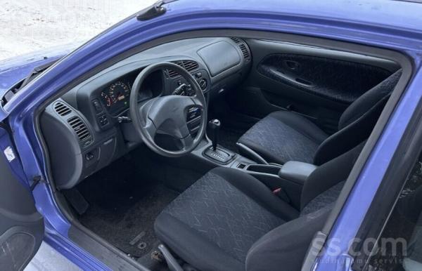 Blue Mitsubishi Colt 1998 in Riga, with an engine capacity of 1.30 L and mileage of 153 thousand km for 1350 €, photo 4 on AUTOMOTO.COM.LV