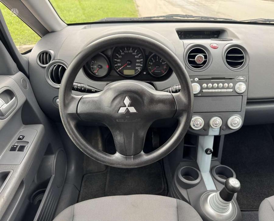 Blue Mitsubishi Colt 2004 in Vilnius, with an engine capacity of 1.50 L and mileage of 136 thousand km for 1950 €, photo 15 on AUTOMOTO.COM.LV