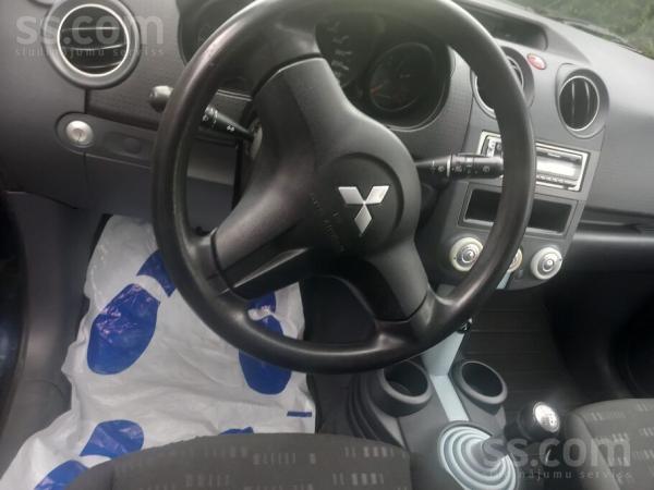 Blue Mitsubishi Colt 2005 in Jekabpils, with an engine capacity of 1.30 L and mileage of 169 thousand km for 1500 €, photo 4 on AUTOMOTO.COM.LV