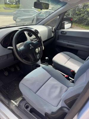 Zils Mitsubishi Colt 2005 Klaipėda, ar dzinēja tilpumu 1.12 L un nobraukumu 176 tūkst. km par 1000 €, foto 6 vietnē AUTOMOTO.COM.LV