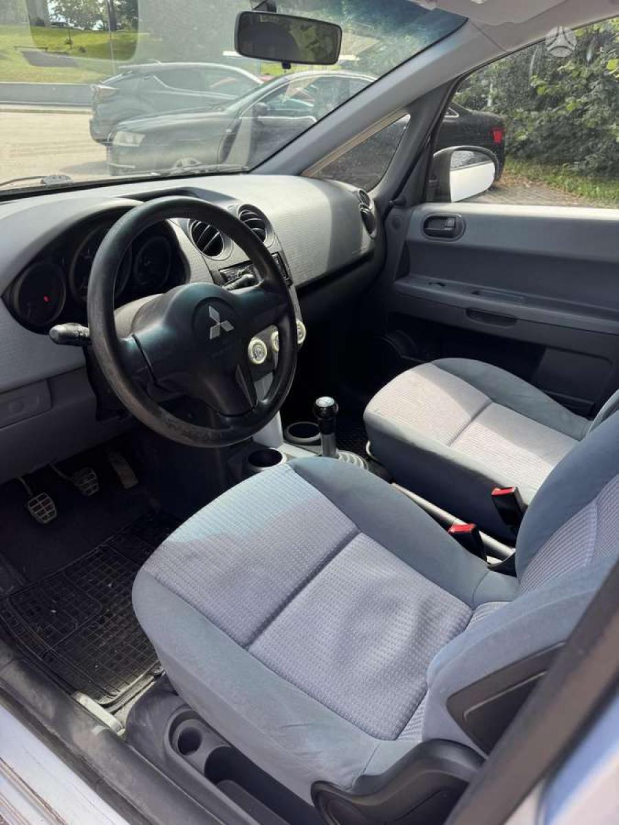 Zils Mitsubishi Colt 2005 Klaipėda, ar dzinēja tilpumu 1.12 L un nobraukumu 176 tūkst. km par 1000 €, foto 6 vietnē AUTOMOTO.COM.LV