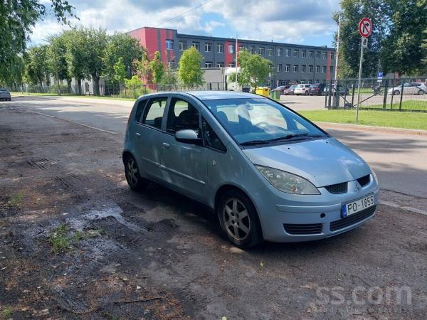 Zils Mitsubishi Colt 2005 Rīga, ar dzinēja tilpumu 1.50 L un nobraukumu 246 tūkst. km par 1000 €, foto 1 vietnē AUTOMOTO.COM.LV