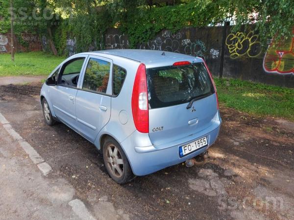 Zils Mitsubishi Colt 2005 Rīga, ar dzinēja tilpumu 1.50 L un nobraukumu 246 tūkst. km par 1000 €, foto 2 vietnē AUTOMOTO.COM.LV