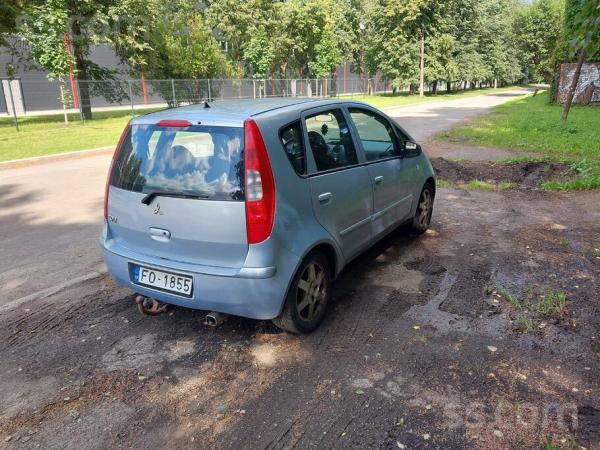 Zils Mitsubishi Colt 2005 Rīga, ar dzinēja tilpumu 1.50 L un nobraukumu 246 tūkst. km par 1000 €, foto 3 vietnē AUTOMOTO.COM.LV