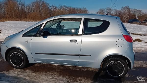 Blue Mitsubishi Colt 2006 in Kaunas, with an engine capacity of 1.10 L and mileage of 202 thousand km for 550 €, photo 3 on AUTOMOTO.COM.LV