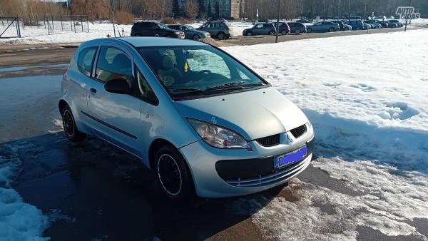 Blue Mitsubishi Colt 2006 in Kaunas, with an engine capacity of 1.10 L and mileage of 202 thousand km for 550 €, photo 6 on AUTOMOTO.COM.LV