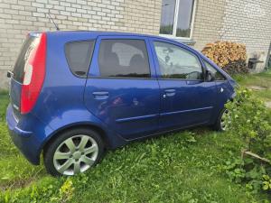 Blue Mitsubishi Colt 2006 in Prienai, with an engine capacity of 1.30 L and mileage of 313 thousand km for 1250 €, photo 3 on AUTOMOTO.COM.LV