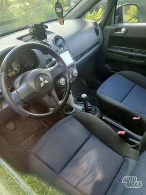 Blue Mitsubishi Colt 2006 in Prienai, with an engine capacity of 1.30 L and mileage of 313 thousand km for 1250 €, photo 7 on AUTOMOTO.COM.LV