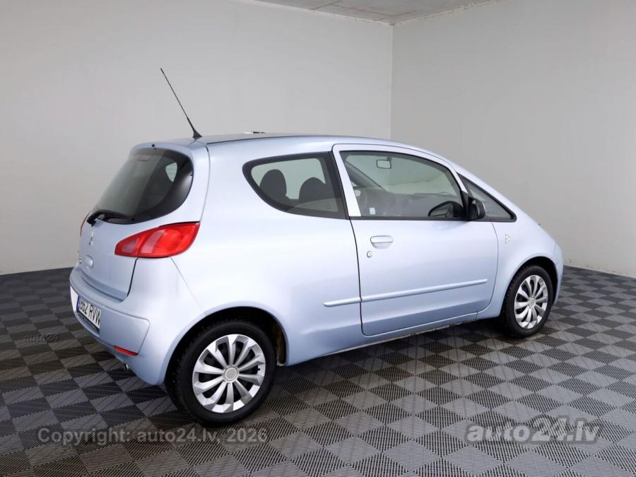 Blue Mitsubishi Colt 2007 in Tallinn, with an engine capacity of 1.30 L and mileage of 126 thousand km for 1499 €, photo 3 on AUTOMOTO.COM.LV