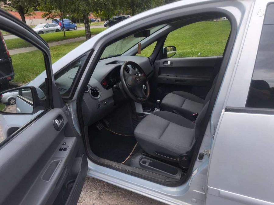 Zils Mitsubishi Colt 2007 Viļņa, ar dzinēja tilpumu 1.33 L un nobraukumu 76 tūkst. km par 1000 €, foto 13 vietnē AUTOMOTO.COM.LV