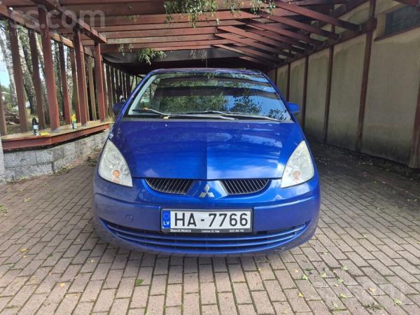 Zils Mitsubishi Colt 2008 Rīga, ar dzinēja tilpumu 1.30 L un nobraukumu 201 tūkst. km par 1600 €, foto 6 vietnē AUTOMOTO.COM.LV