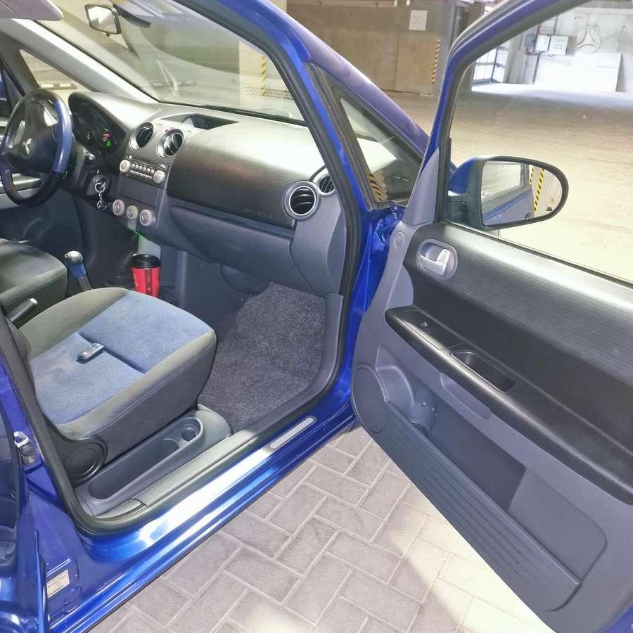 Blue Mitsubishi Colt 2006 in Siauliai, with an engine capacity of 1.33 L and mileage of 144 thousand km for 1450 €, photo 14 on AUTOMOTO.COM.LV