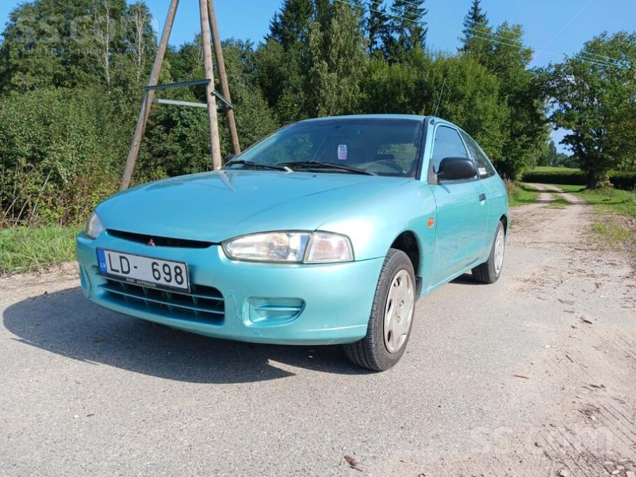 Blue Mitsubishi Colt 1997 in Cesis, with an engine capacity of 1.30 L and mileage of 244 thousand km for 600 €, photo 1 on AUTOMOTO.COM.LV