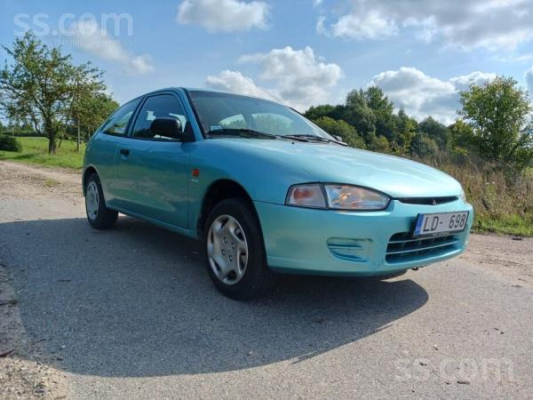 Zils Mitsubishi Colt 1997 Cēsis, ar dzinēja tilpumu 1.30 L un nobraukumu 244 tūkst. km par 700 €, foto 2 vietnē AUTOMOTO.COM.LV