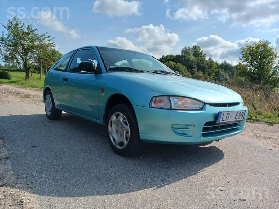 Blue Mitsubishi Colt 1997 in Cesis, with an engine capacity of 1.30 L and mileage of 244 thousand km for 600 €, photo 2 on AUTOMOTO.COM.LV