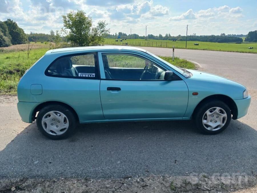 Blue Mitsubishi Colt 1997 in Cesis, with an engine capacity of 1.30 L and mileage of 244 thousand km for 600 €, photo 3 on AUTOMOTO.COM.LV