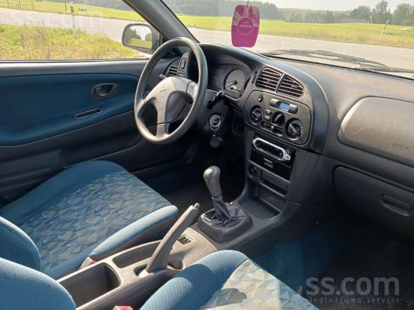 Zils Mitsubishi Colt 1997 Cēsis, ar dzinēja tilpumu 1.30 L un nobraukumu 244 tūkst. km par 700 €, foto 6 vietnē AUTOMOTO.COM.LV