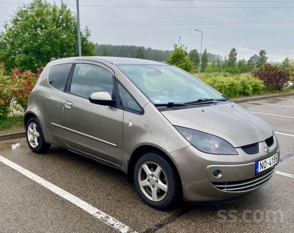 Brown Mitsubishi Colt 2007 in Riga, with an engine capacity of 1.30 L and mileage of 141 thousand km for 1900 €, photo 5 on AUTOMOTO.COM.LV