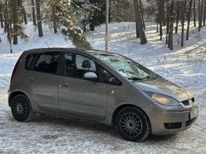 Brown Mitsubishi Colt 2008 in Vilnius, with an engine capacity of 1.33 L and mileage of 152 thousand km for 1400 €, photo 4 on AUTOMOTO.COM.LV