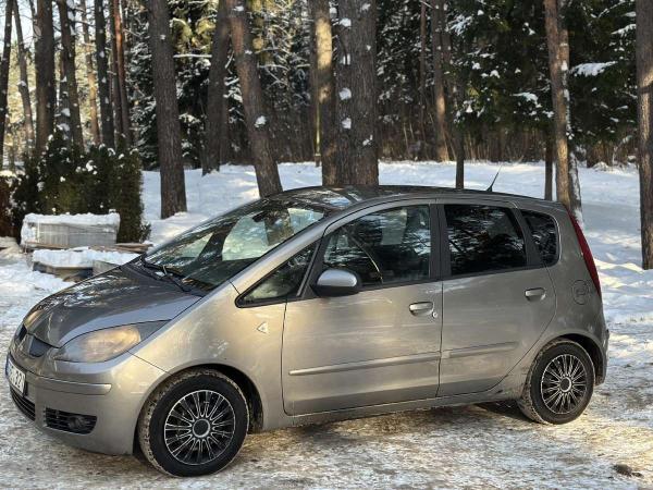 Brown Mitsubishi Colt 2008 in Vilnius, with an engine capacity of 1.33 L and mileage of 152 thousand km for 1400 €, photo 5 on AUTOMOTO.COM.LV