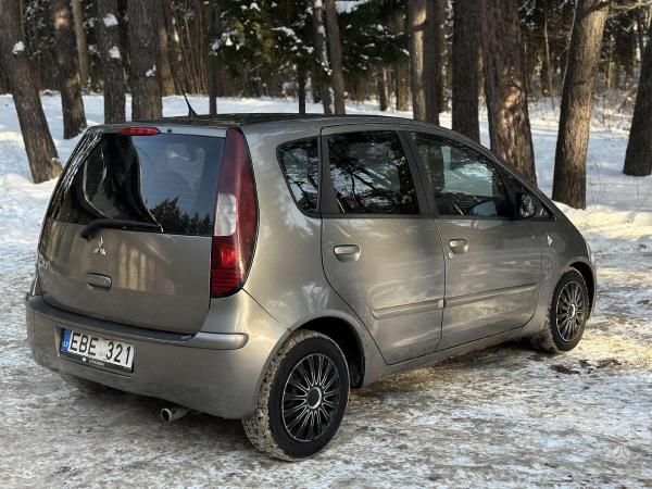Brown Mitsubishi Colt 2008 in Vilnius, with an engine capacity of 1.33 L and mileage of 152 thousand km for 1400 €, photo 6 on AUTOMOTO.COM.LV