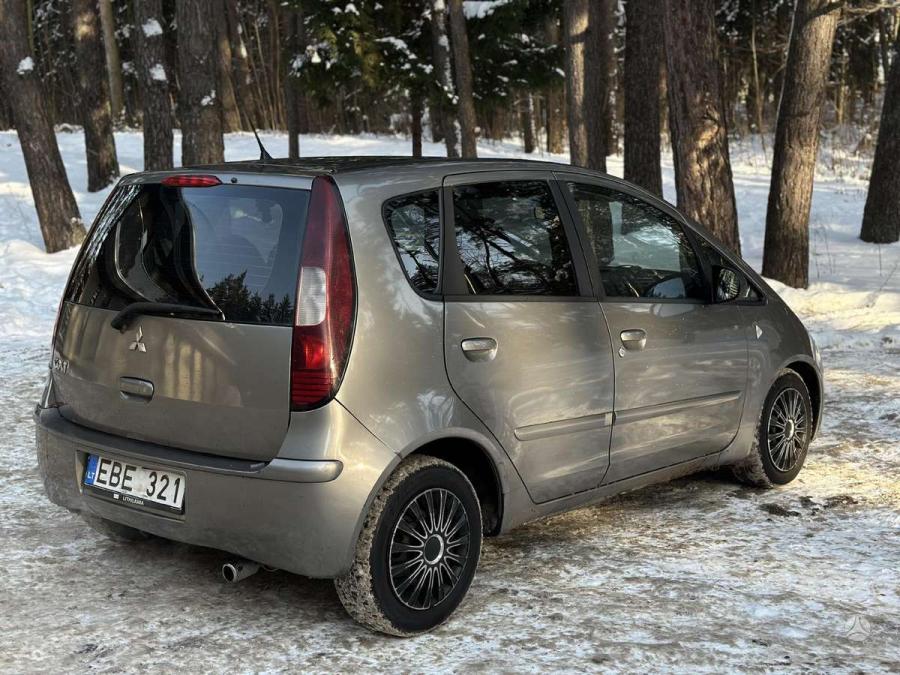 Brown Mitsubishi Colt 2008 in Vilnius, with an engine capacity of 1.33 L and mileage of 152 thousand km for 1400 €, photo 6 on AUTOMOTO.COM.LV