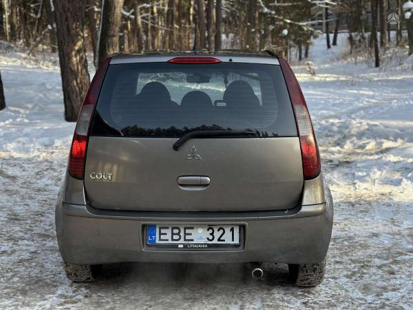 Brown Mitsubishi Colt 2008 in Vilnius, with an engine capacity of 1.33 L and mileage of 152 thousand km for 1400 €, photo 7 on AUTOMOTO.COM.LV